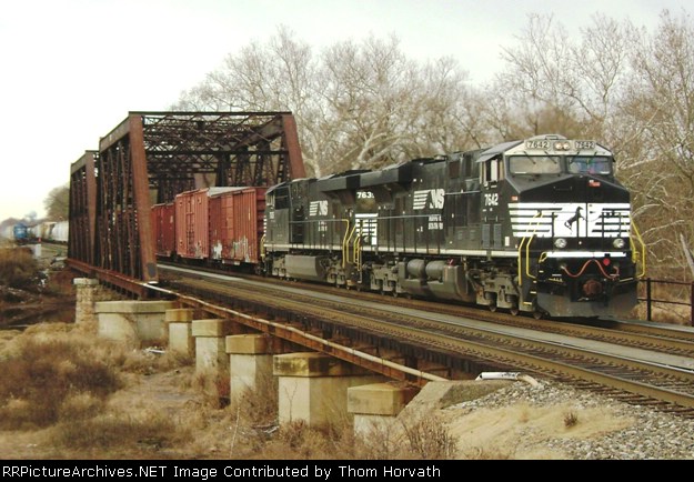 NS 18G brings its consist of mixed freight east at 8:54